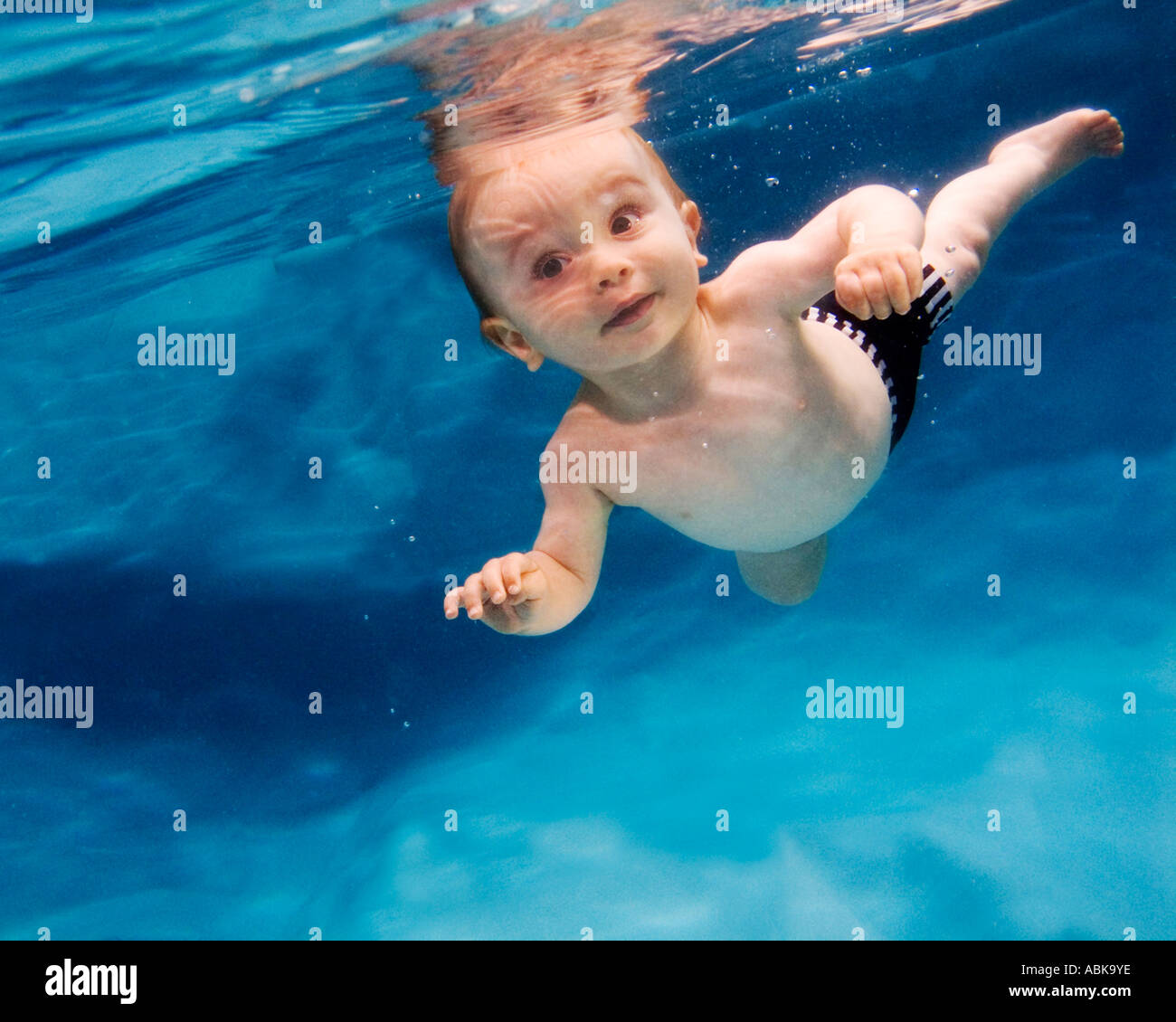 Baby swimming under water hi-res stock photography and images - Alamy