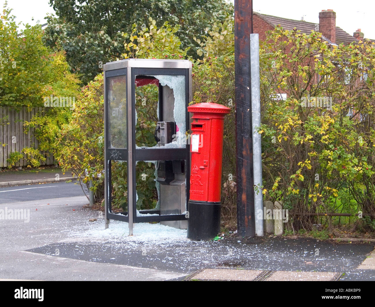 Vandalised telephone box Stock Photo - Alamy