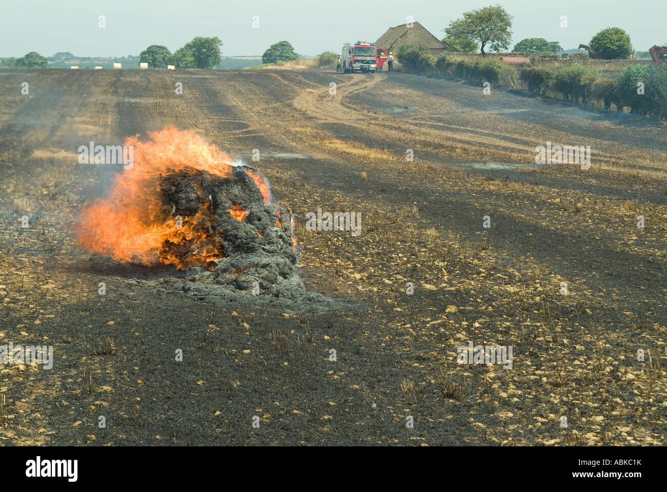 Bales of straw alight after the baler caught fire in barley field ...