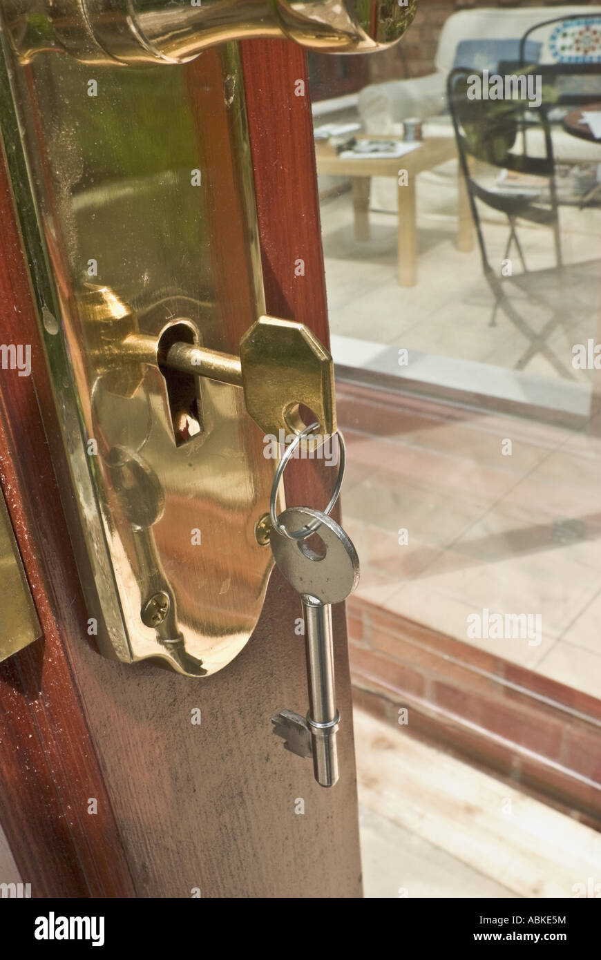 key in door door security Stock Photo - Alamy