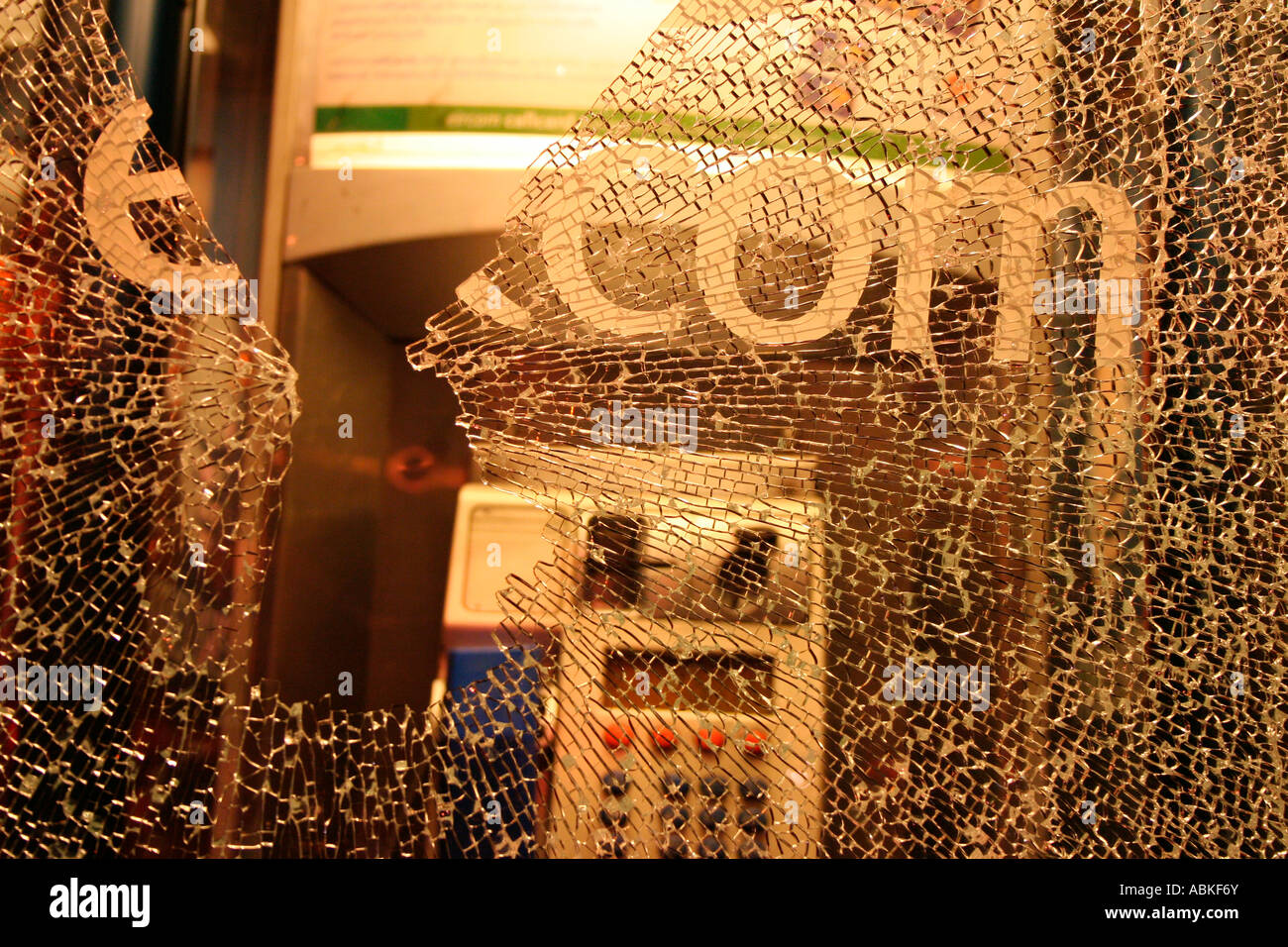 Smashed glass in telephone box Stock Photo - Alamy