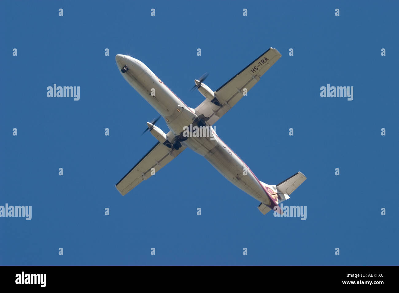 Thai Airways Airplane flying overhead twin engine propeller plane Stock ...
