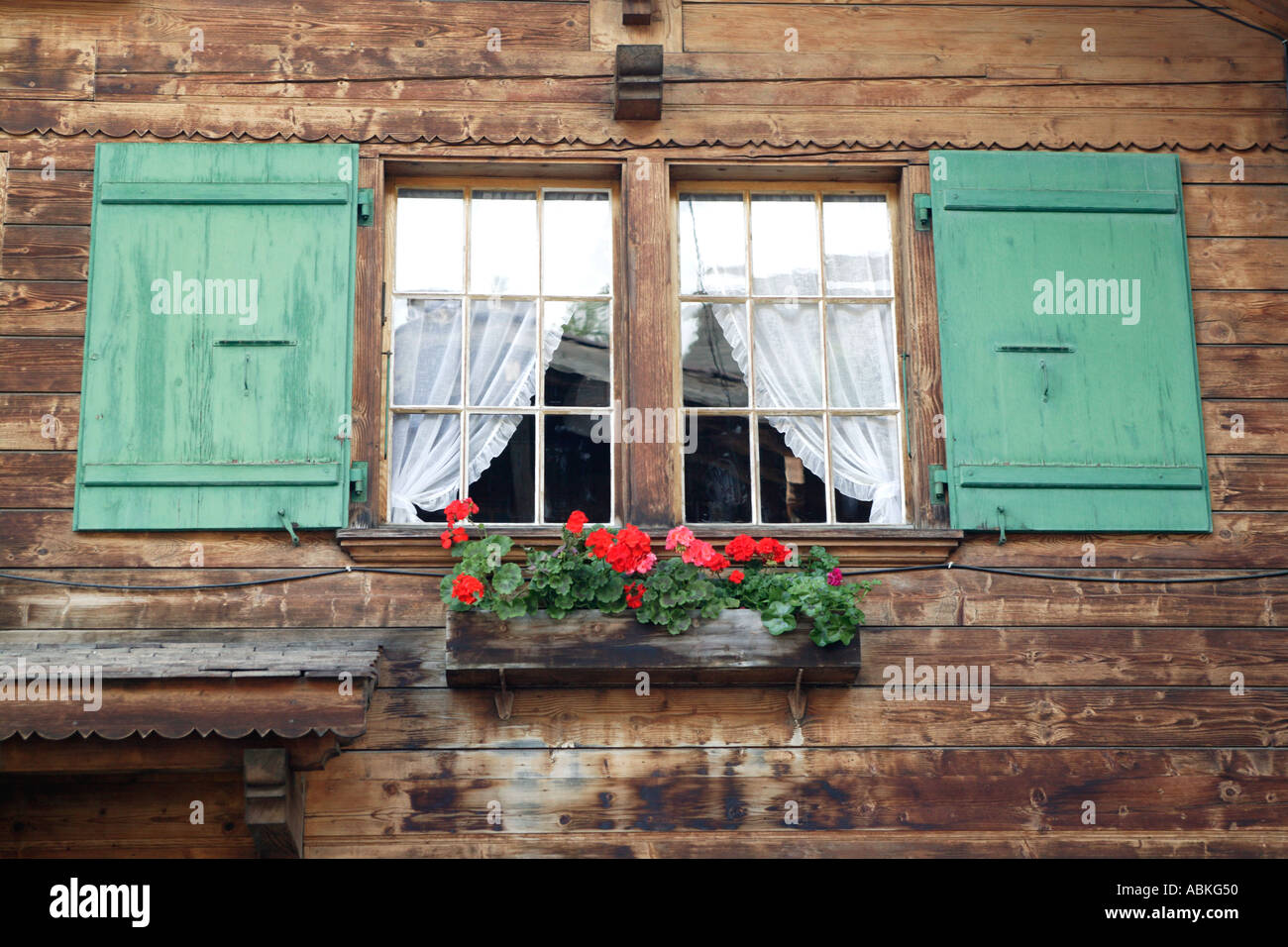 Typical window display of traditional Swiss Alpine chalet Chateau d Oex ...