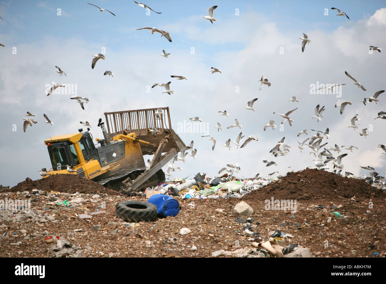 Bulldozer on landfill site seems hi-res stock photography and images ...