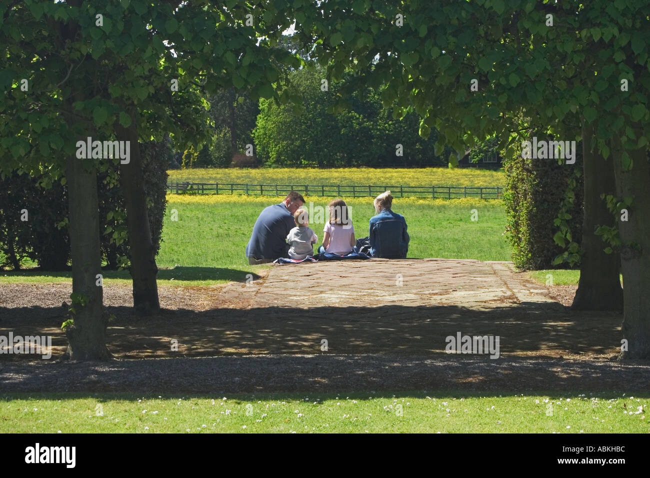 family enjoying picnic on steps at country manor wirral 2005 Stock ...