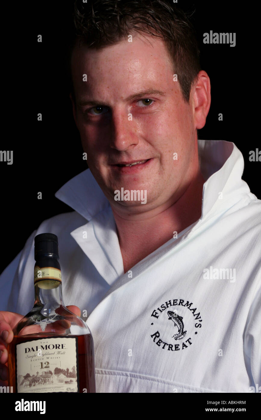 "Cheff with a bottle of Scotch quality whisky Stock Photo - Alamy