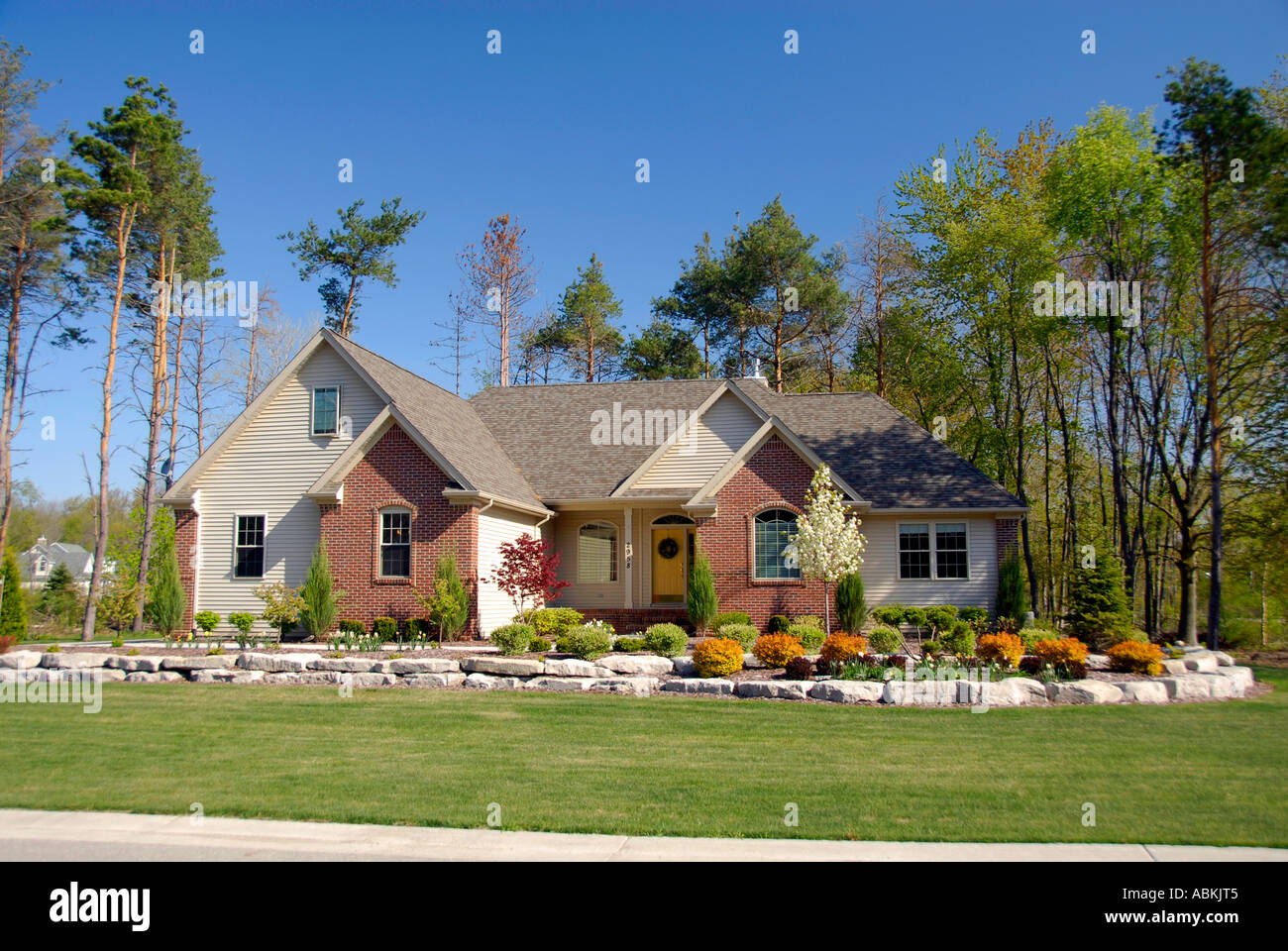 Landscaping surrounding a residential home Stock Photo - Alamy
