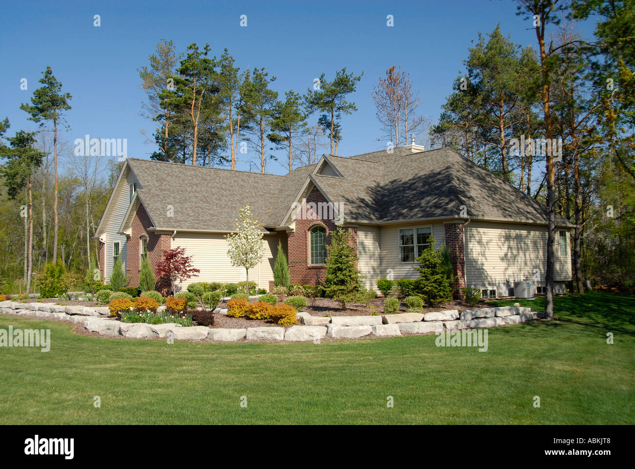 Landscaping surrounding a residential home Stock Photo - Alamy