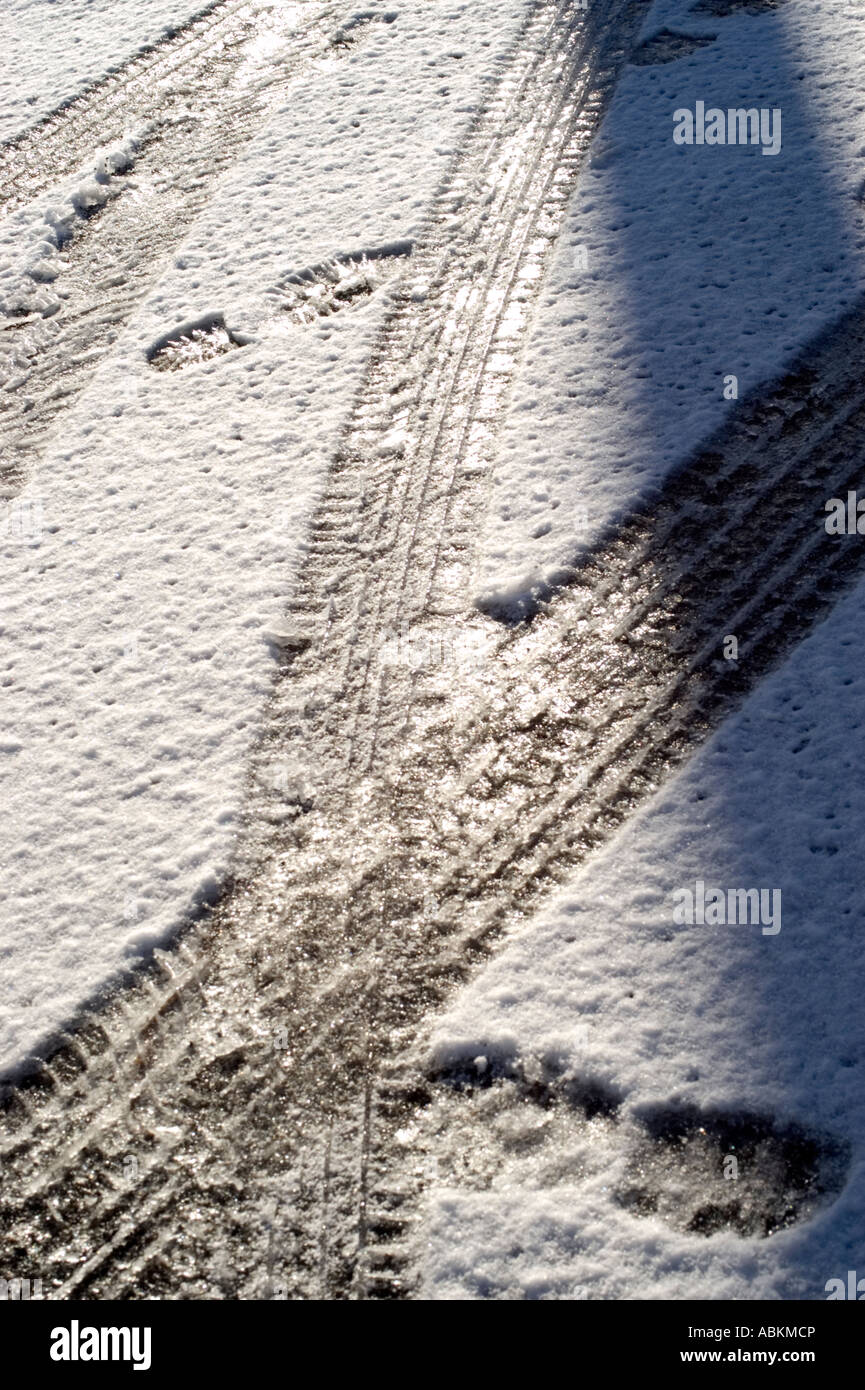 car tyre tracks in ice and snow 2007 Stock Photo - Alamy