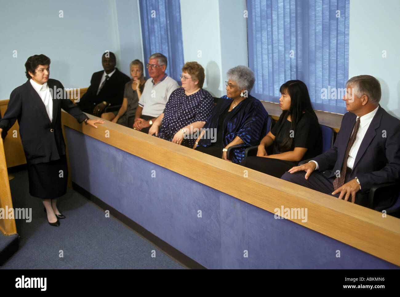 The legal system inside of a court room scene Stock Photo - Alamy