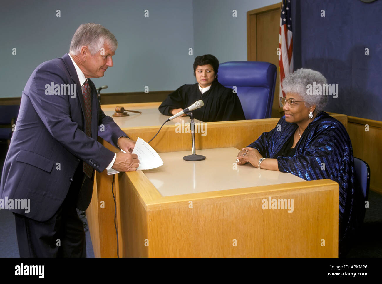 The legal system inside of a court room scene Stock Photo - Alamy