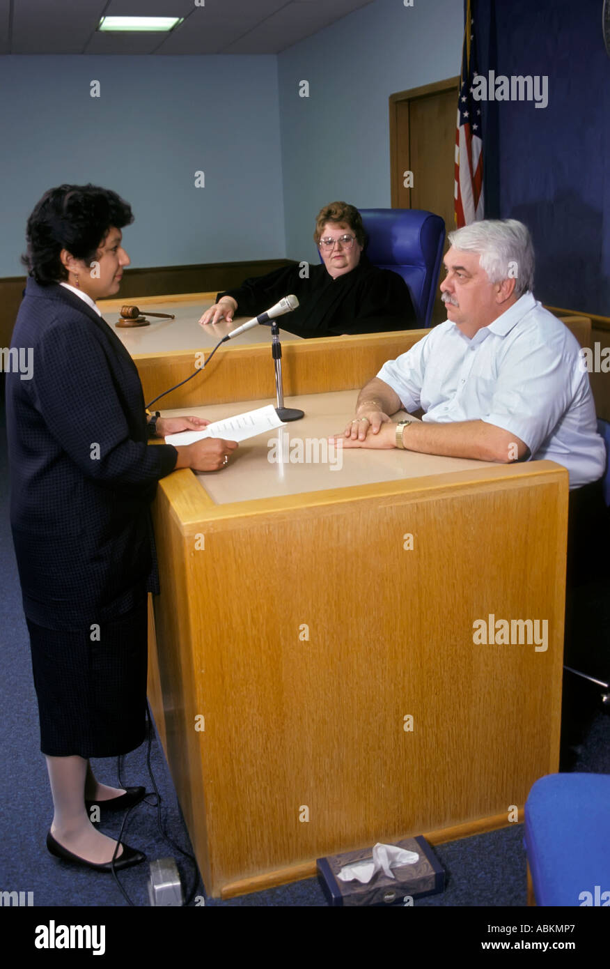 The legal system inside of a court room scene Stock Photo - Alamy