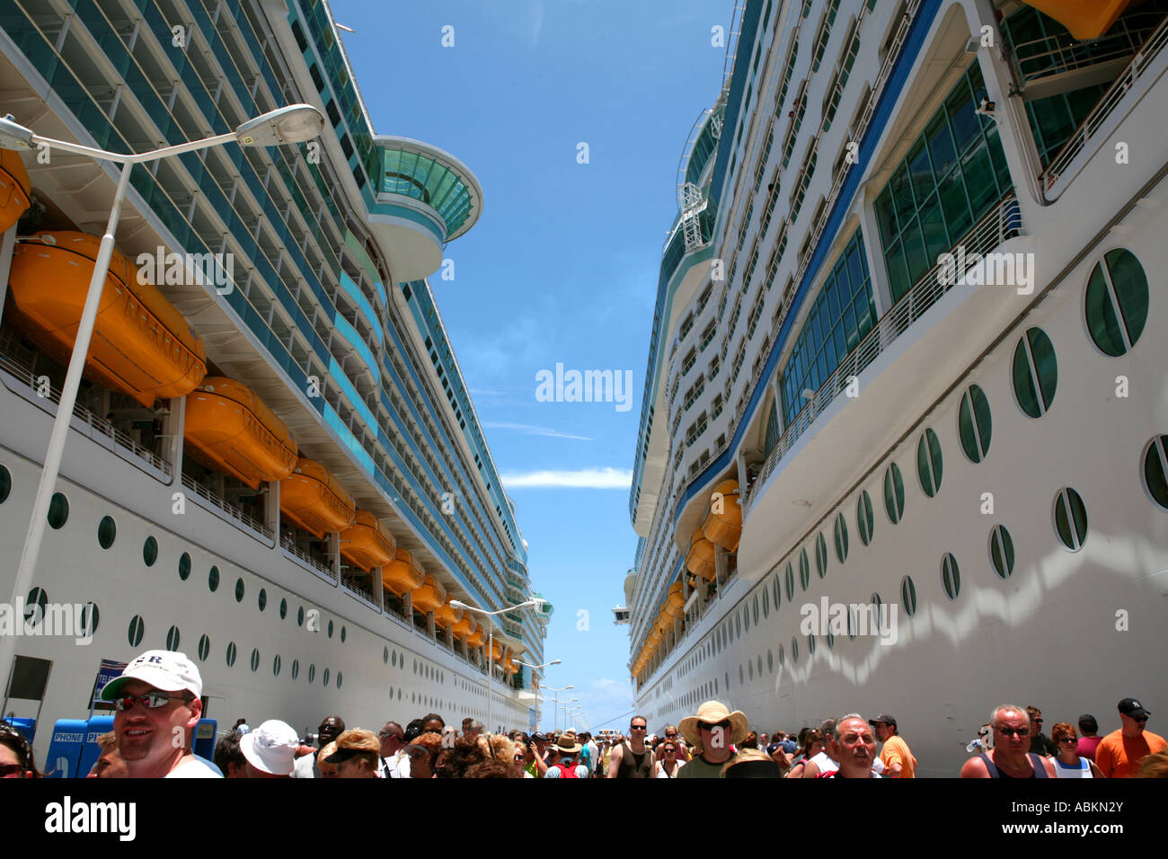 Two Royal Carribean Cruise ships docked alongside each other with ...