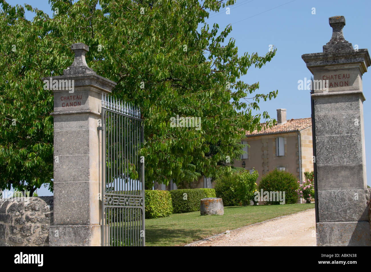 Stone gate posts and iron gate to one of the buildings of Chateau Canon ...