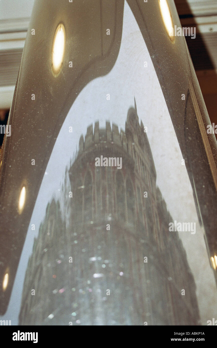 tall city building reflected in shop window mirror london Stock Photo ...