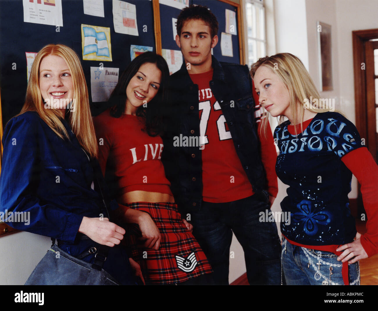 Pupils standing in the corridor and chat Stock Photo - Alamy