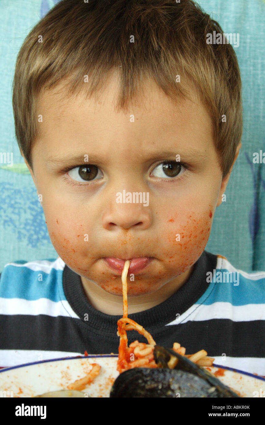 Boy Eating Spaghetti Stock Photo - Alamy