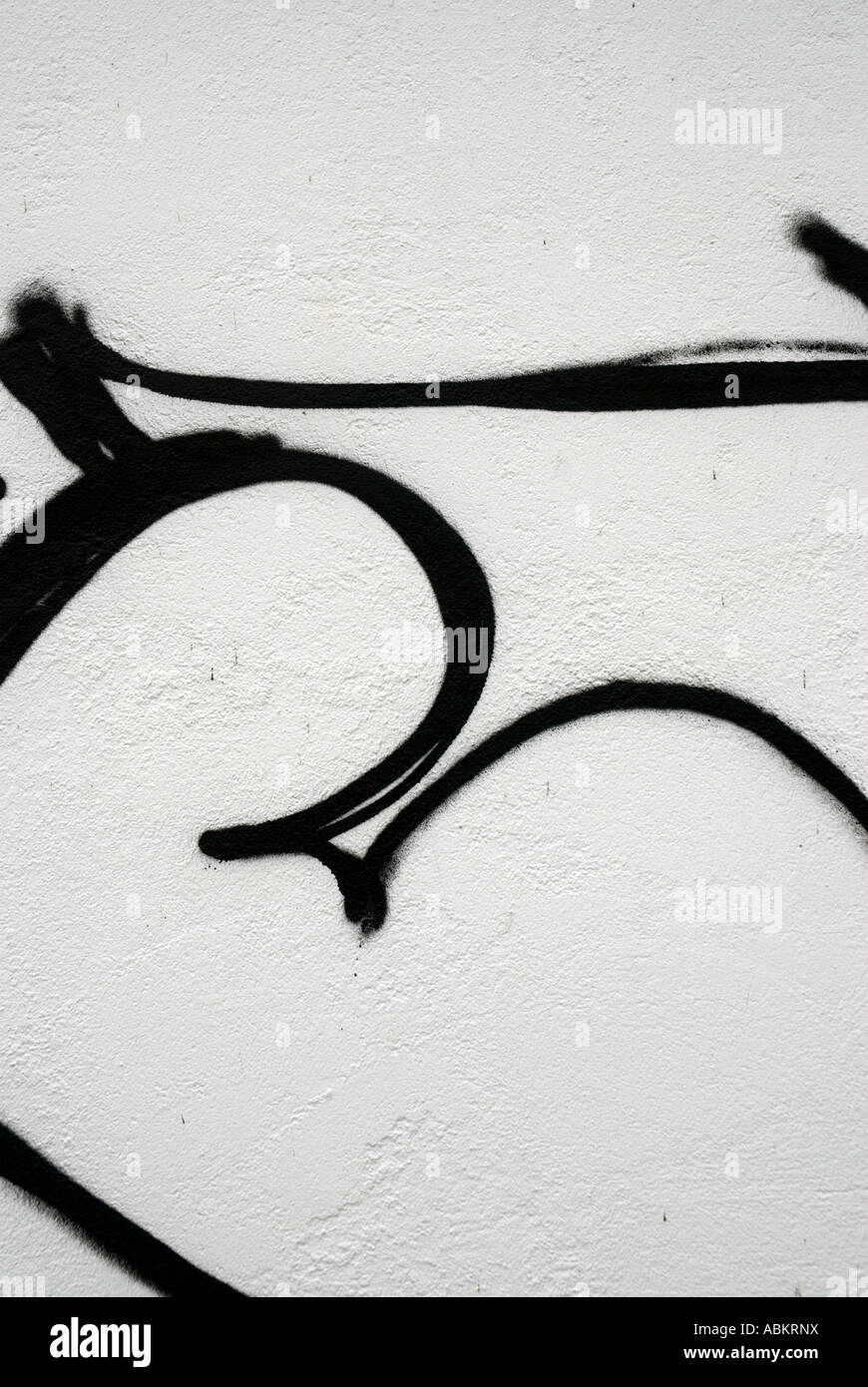 Back graffiti on a white wall Stock Photo - Alamy