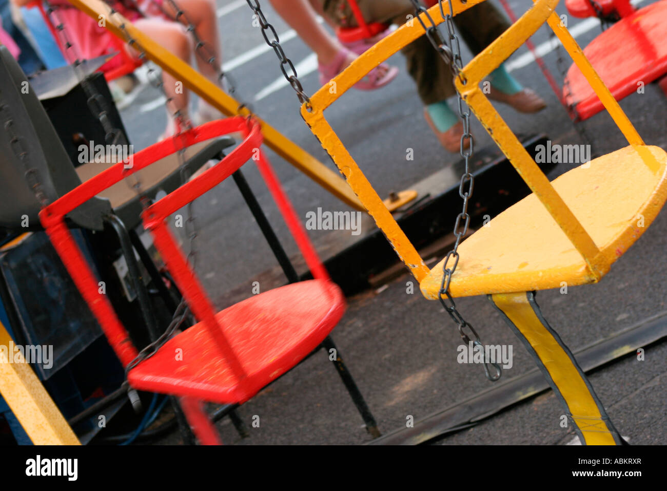 Spinning Swing seat amusement ride Stock Photo - Alamy