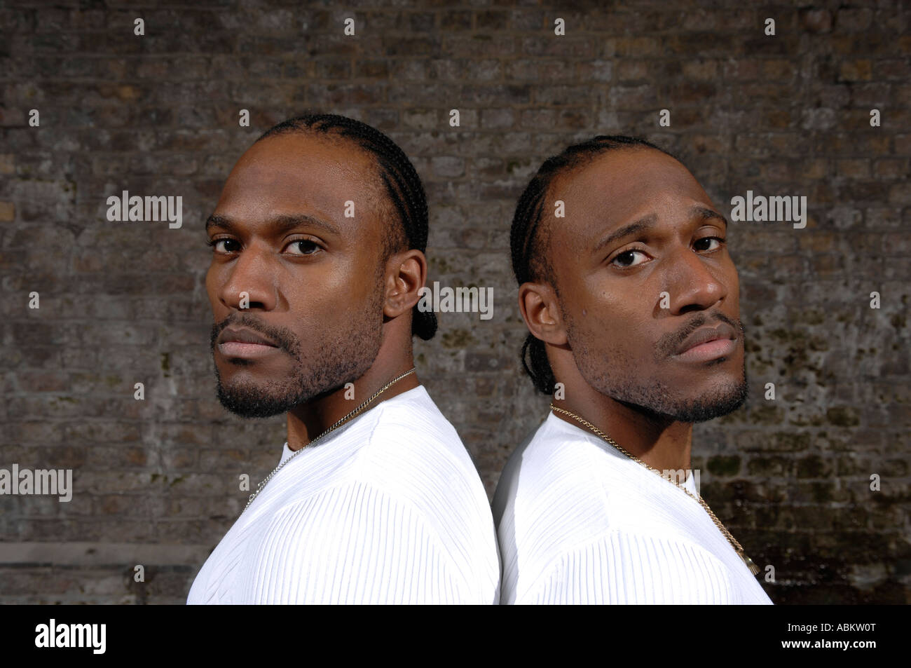 Identical twin hi-res stock photography and images - Alamy