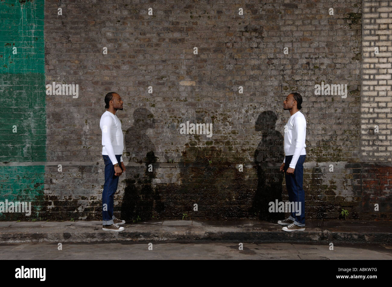 Identical twins different hi-res stock photography and images - Alamy