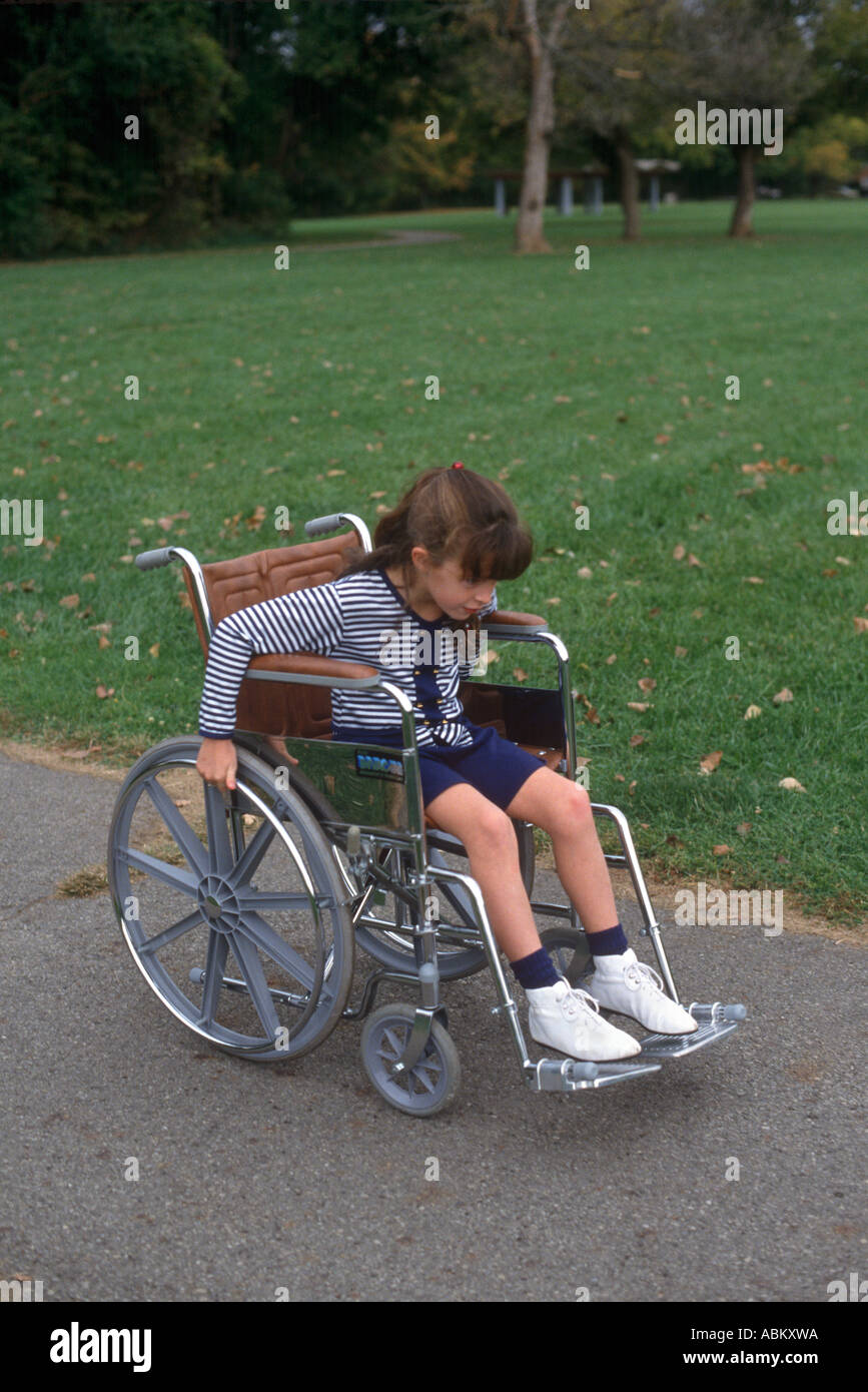Child in wheelchair hi-res stock photography and images - Alamy