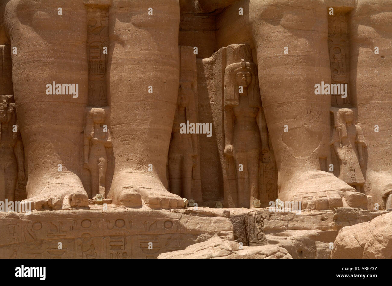 Royal family member at the feet of Ramesses II, Temple of Abu Simbel ...
