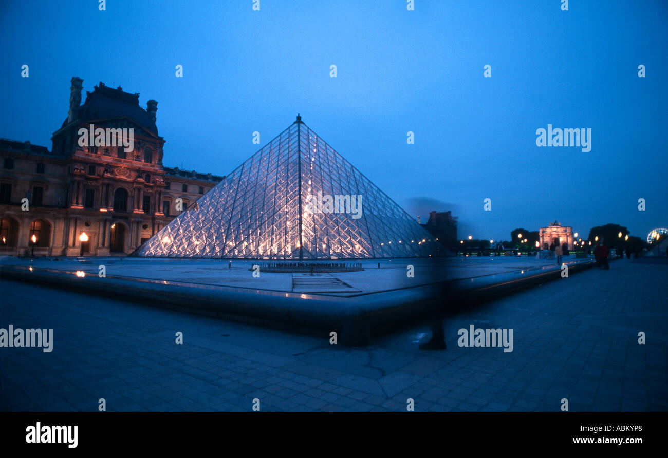 Musee du Louvre at dusk Stock Photo - Alamy