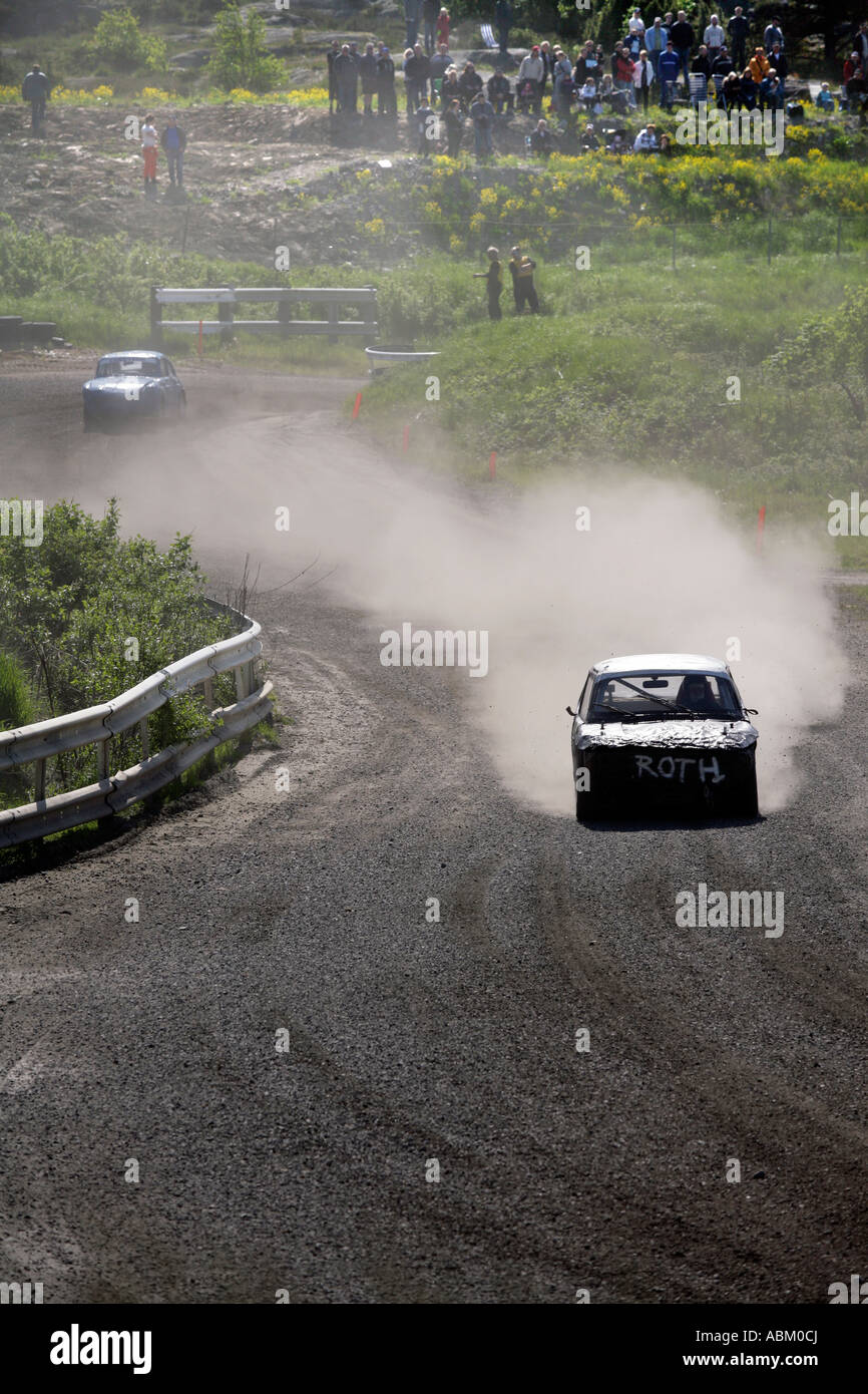 Folkracing banger racing cars speeding through tracks on countryside ...