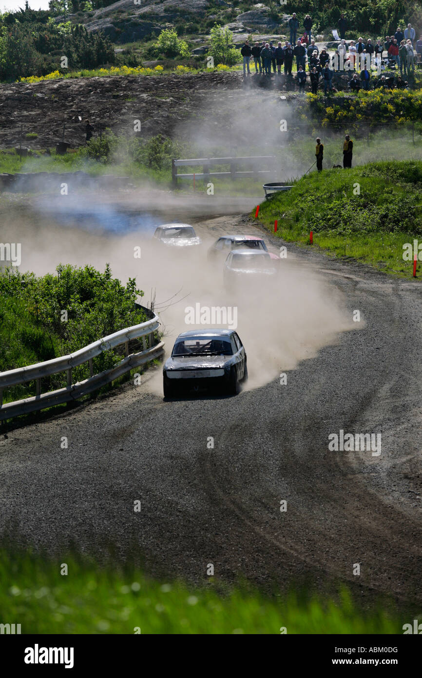 Raising clouds of dust Folkracing banger racing cars speed down ...
