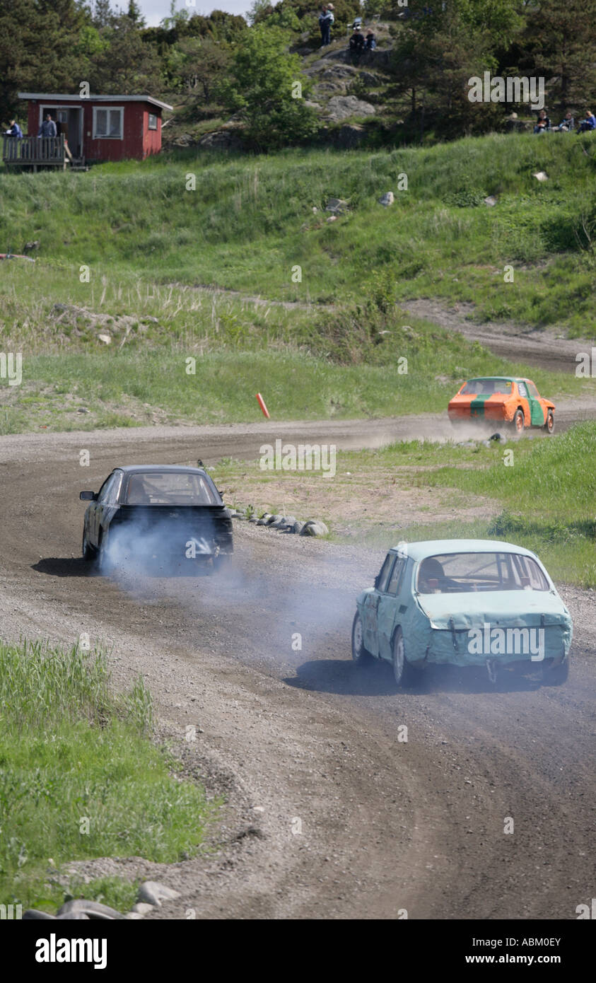 Motorcars in Swedish folk races on gravel tracks of a countryside ...
