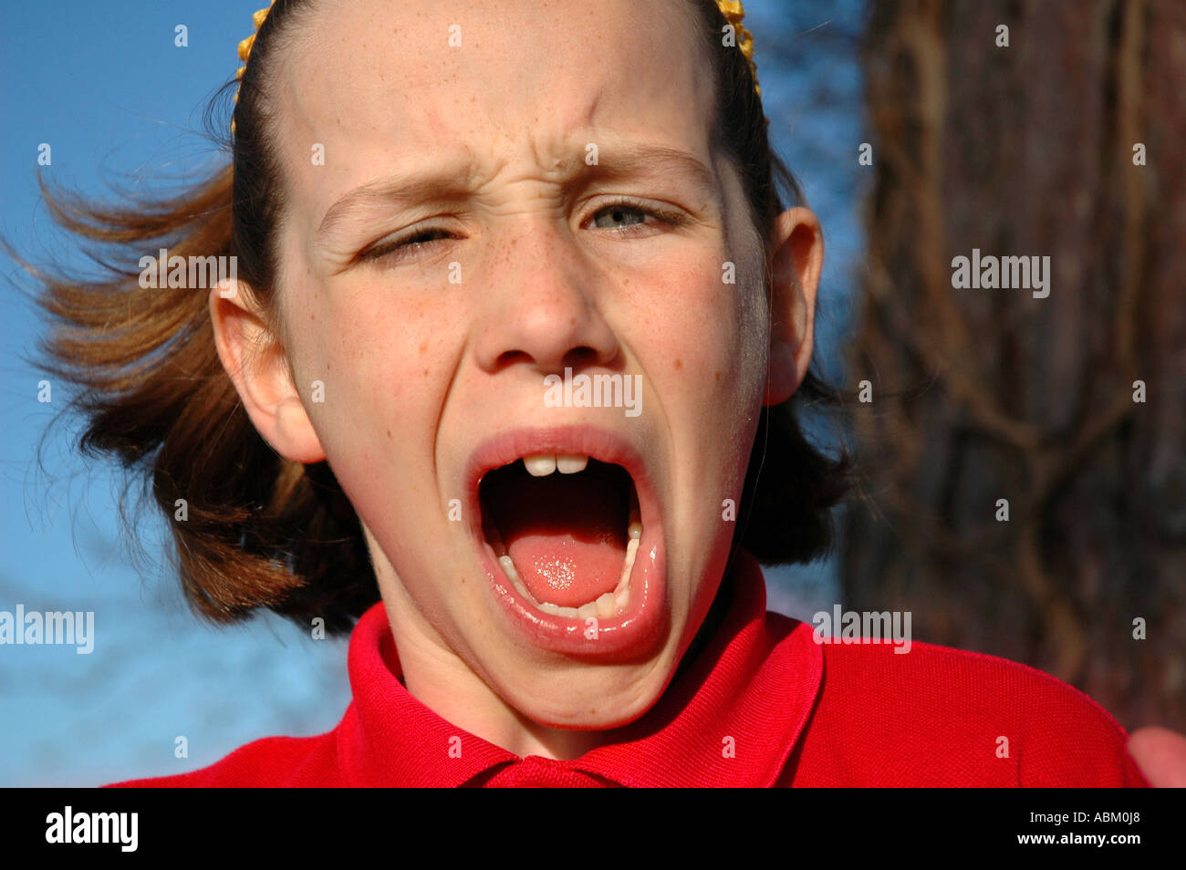 portrait of child looking disgusted and pulling a funny face Stock ...