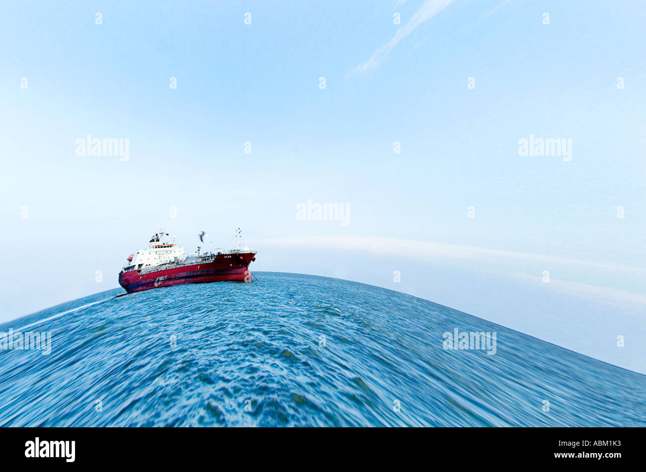 photoshopped oil tanker ship rides a huge ocean wave Stock Photo - Alamy