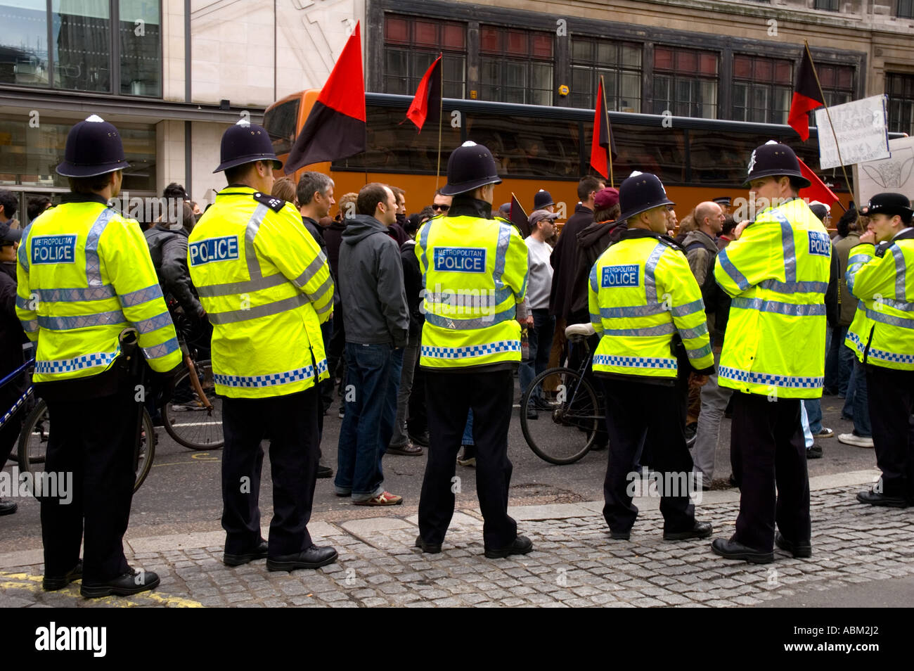 Police overlooking May Day demo in London England UK Stock Photo - Alamy