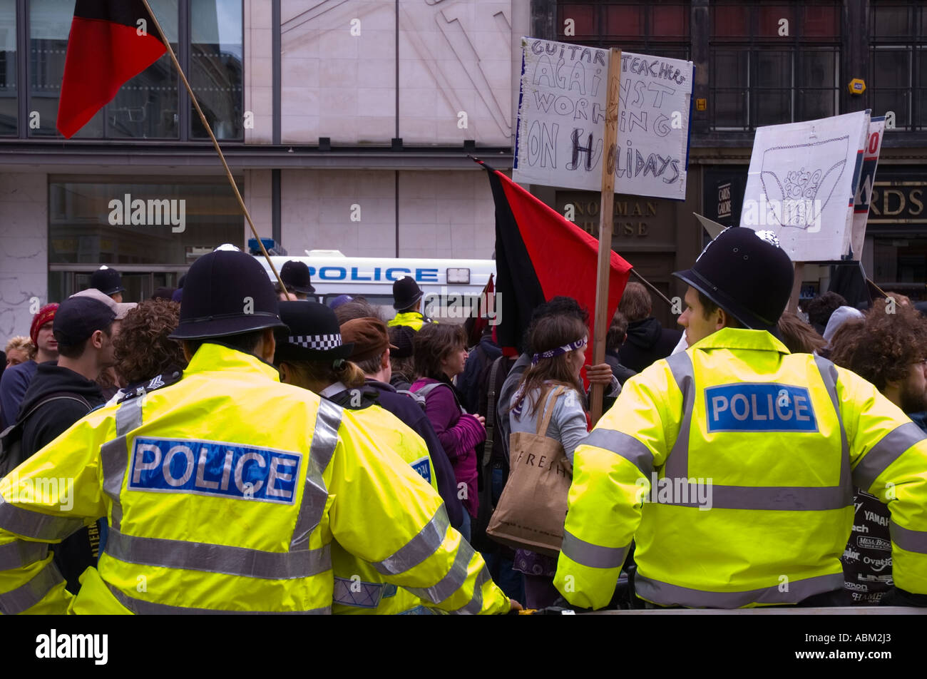 Police overlooking May Day demo in London England UK Stock Photo - Alamy