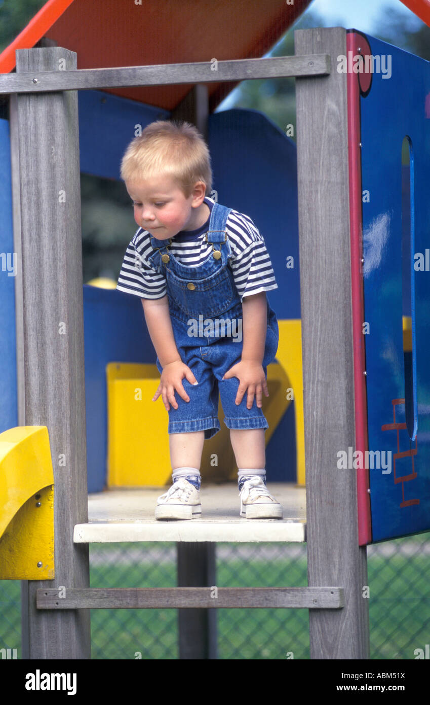 Child standing by a tower hi-res stock photography and images - Alamy
