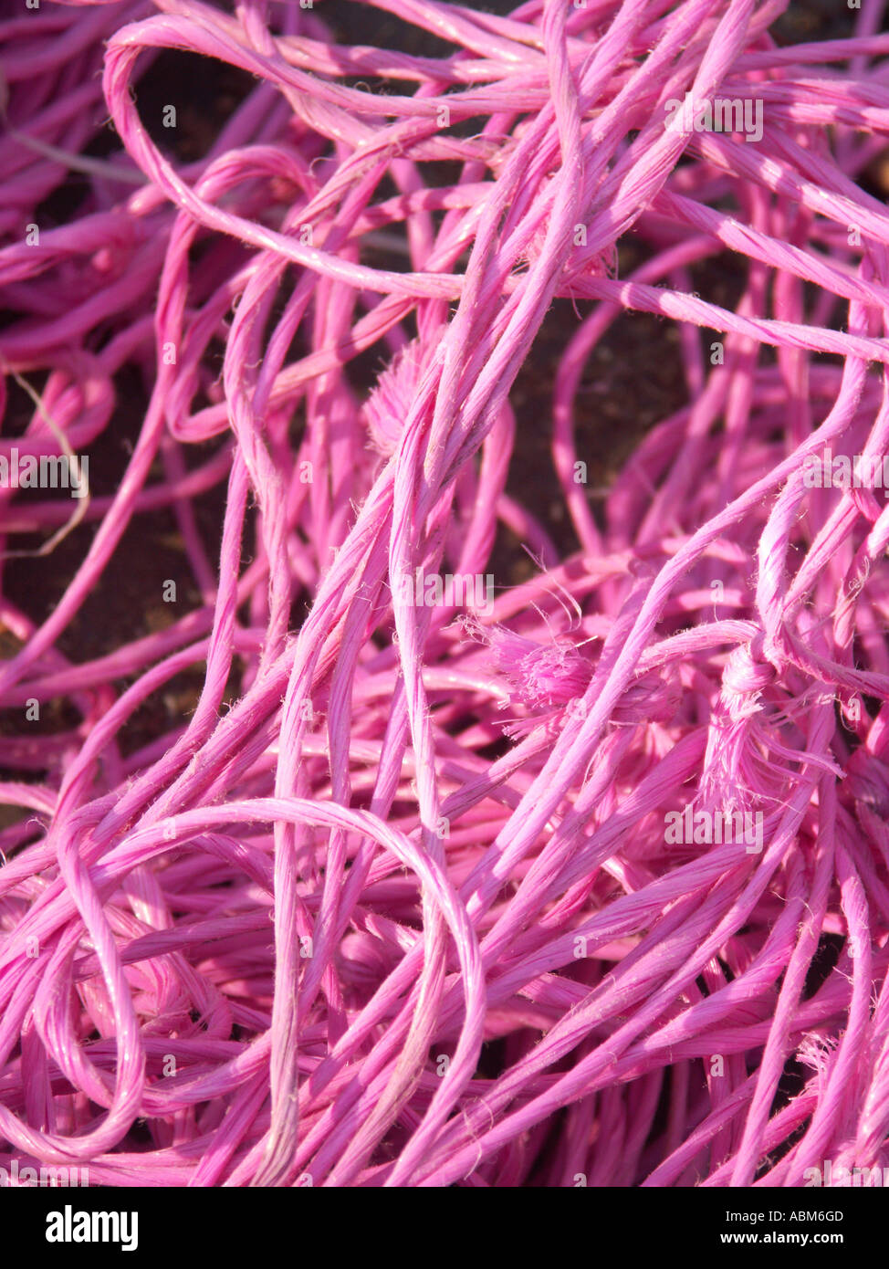 Tangled pink string Stock Photo - Alamy