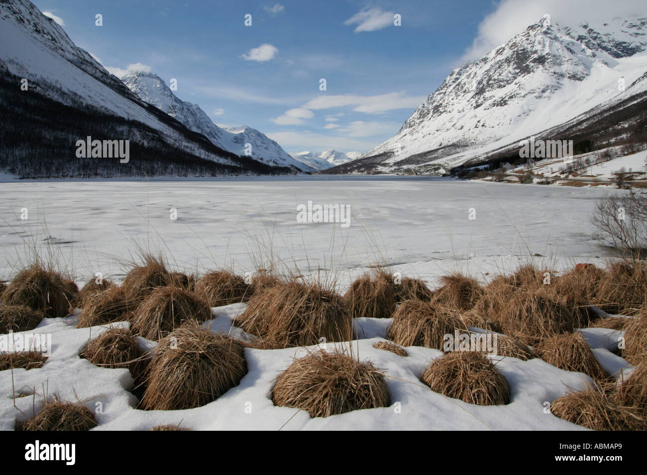 kjosen frozen lake winter thaw in progess mountain scenery norway Stock ...