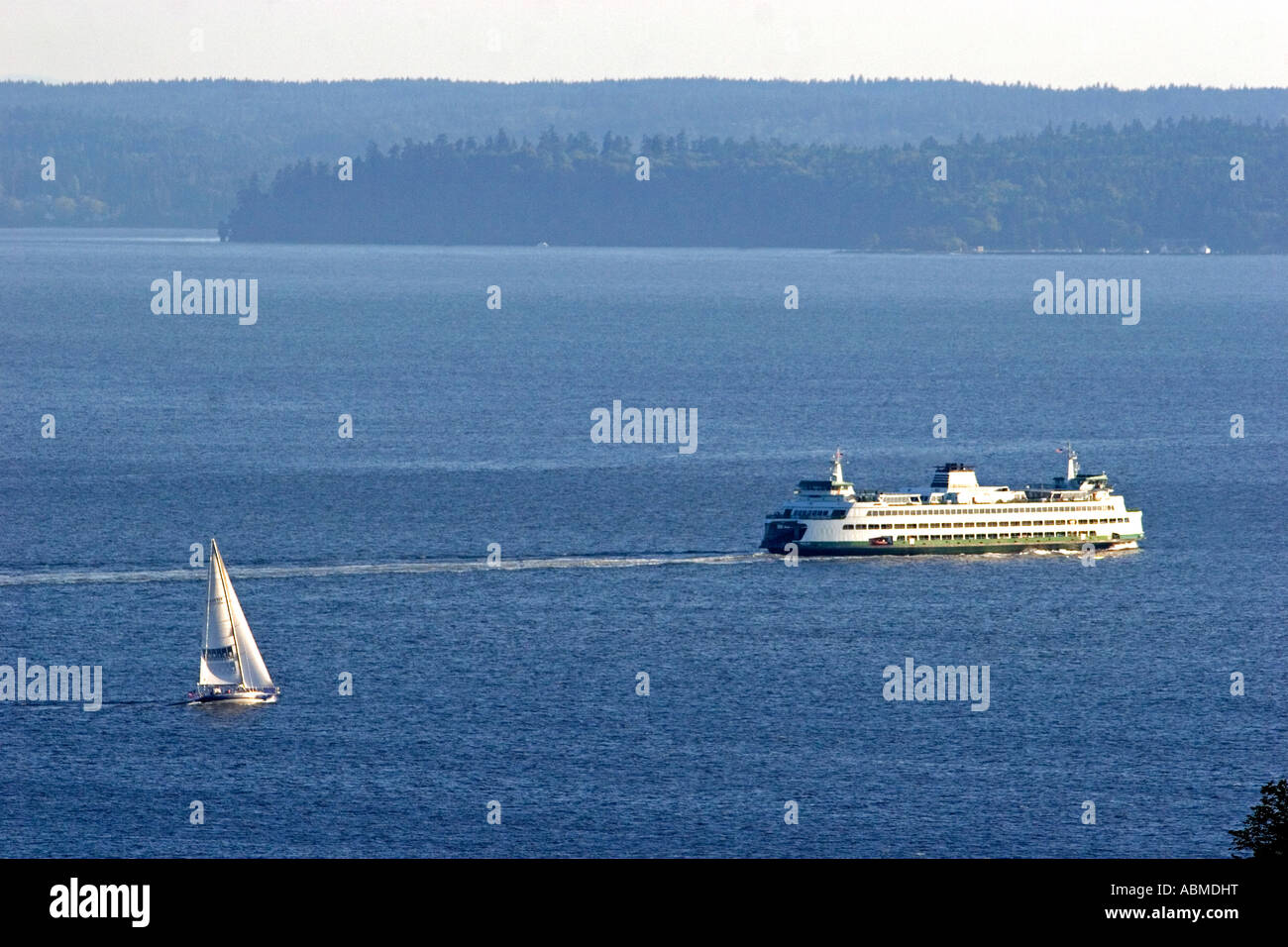 Washington State Ferry Boat and sail boat in Elliott Bay at Seattle ...
