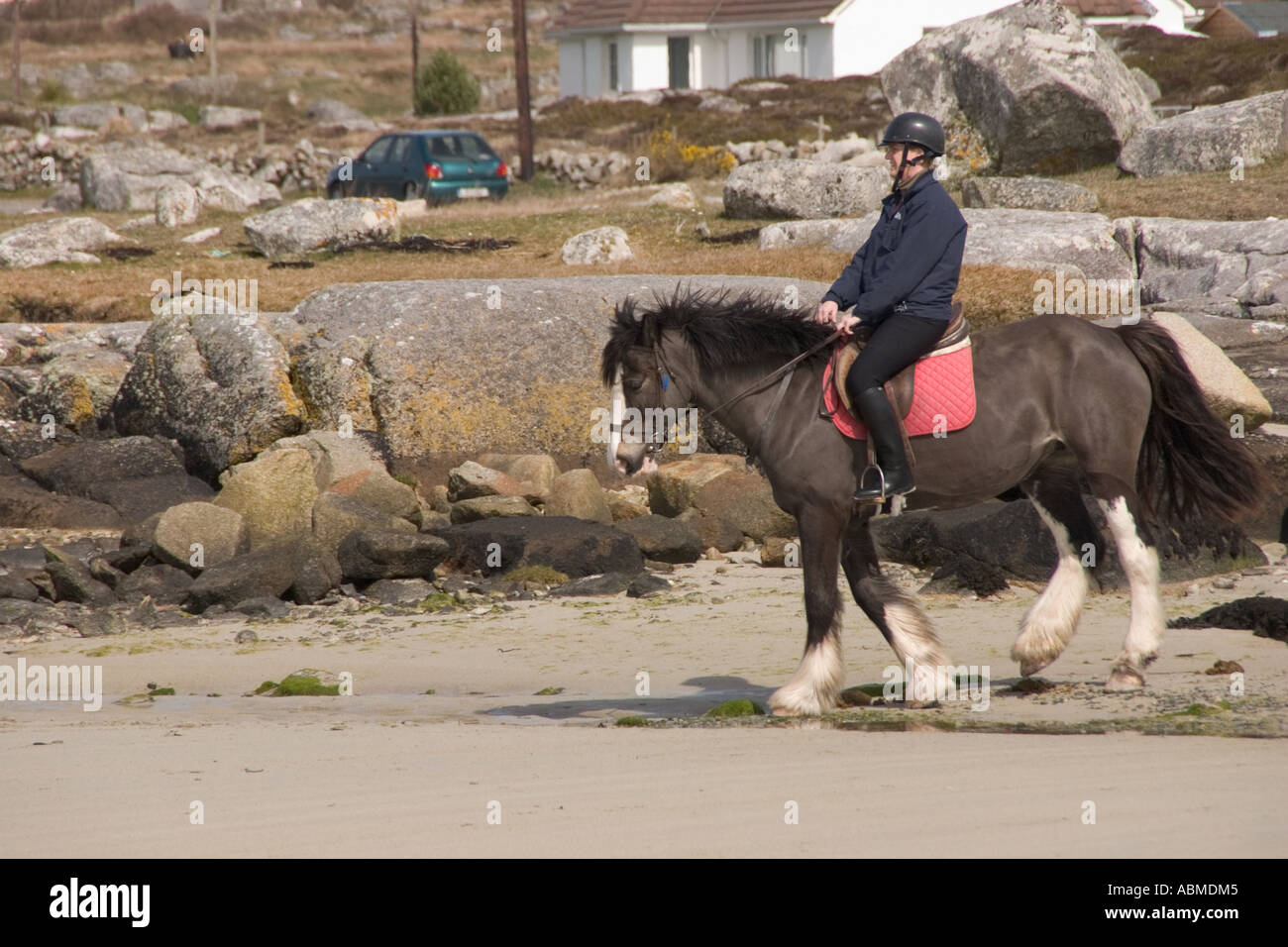 Horse rider on Omey strand Connemara Ireland Stock Photo - Alamy
