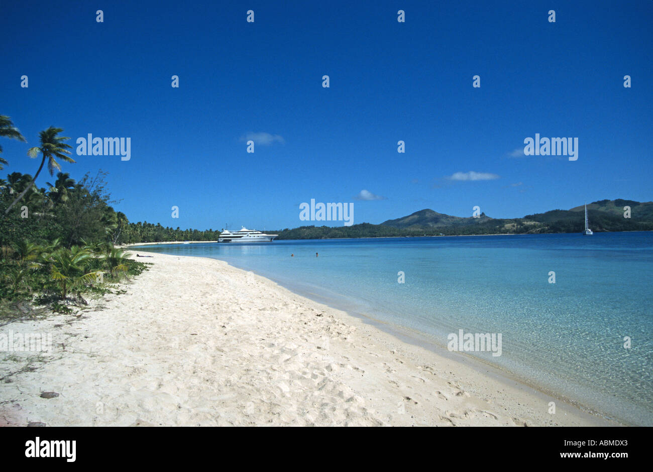 Blue lagoon white sand beach shoreline Stock Photo - Alamy