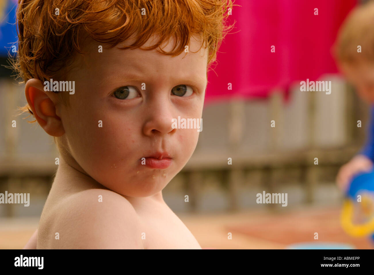 Young redheaded boy looking intensely Stock Photo - Alamy
