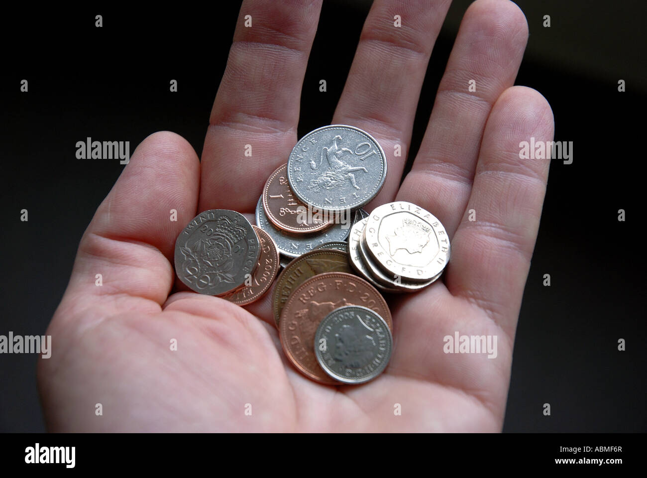 Hand and money and uk hi-res stock photography and images - Alamy