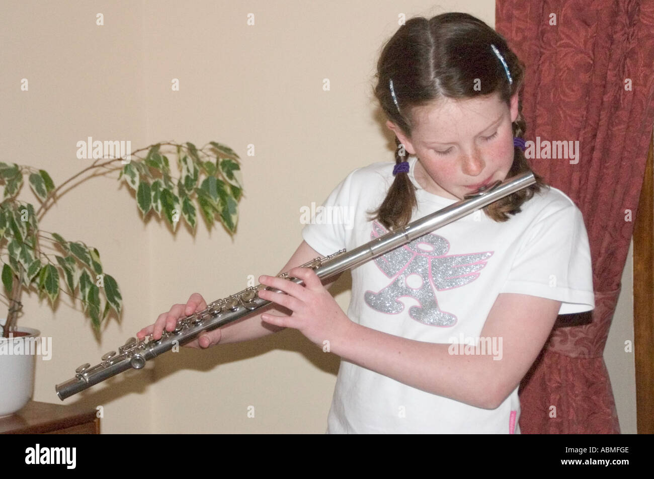 Girl with flute hi-res stock photography and images - Alamy