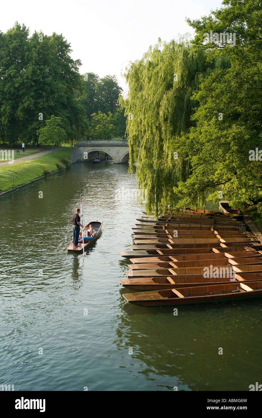 Small group of people punt on the River Cam in Cambridge, England, UK ...