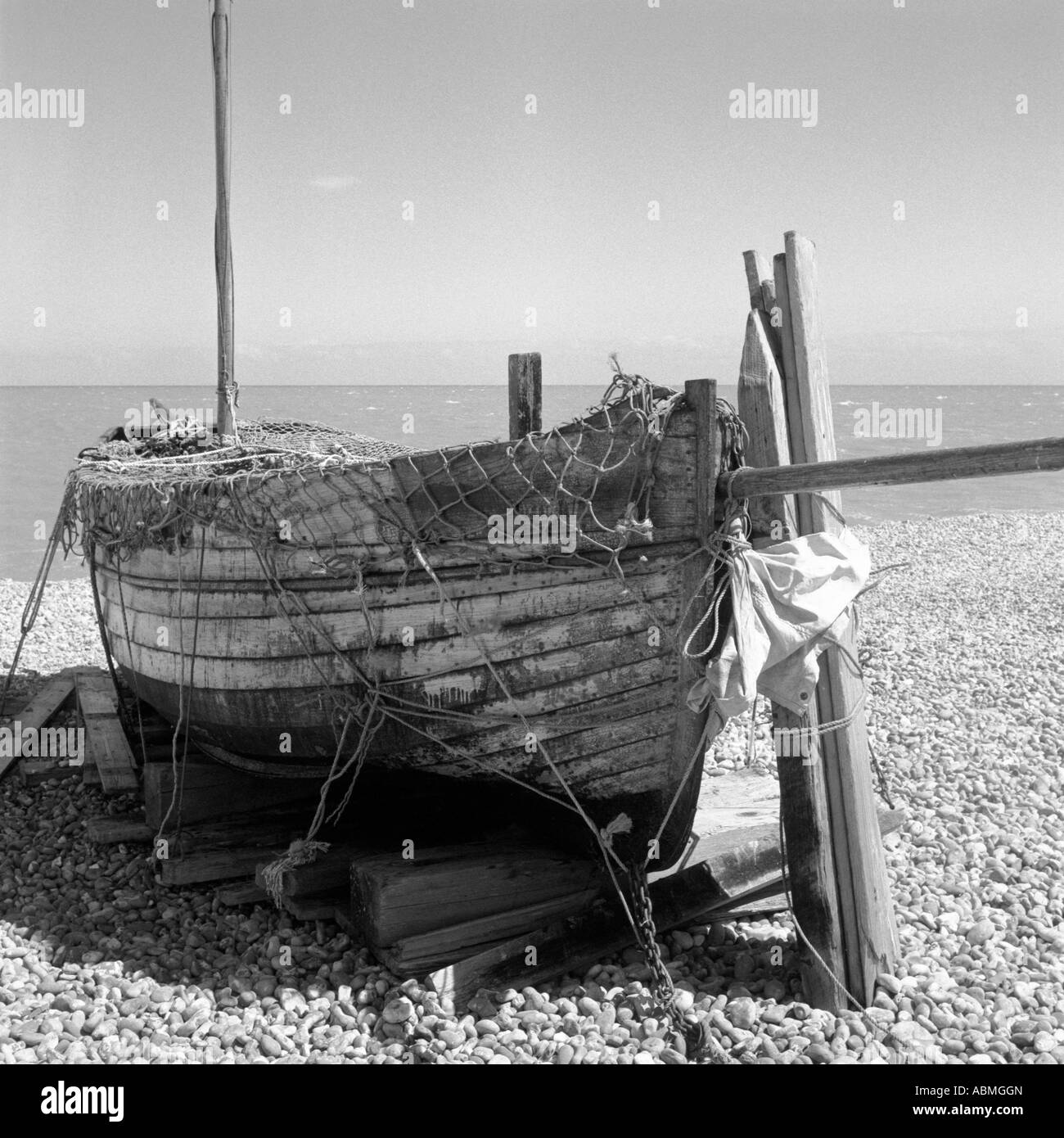 Boat Sea Beach Stranded Black and White Stock Photos & Images - Alamy