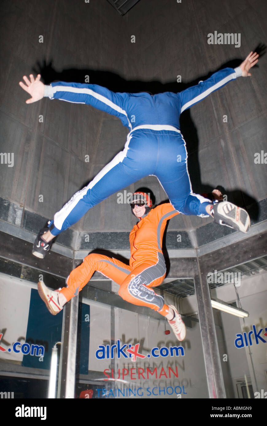 2 skydivers practising inside AirKix at the Xscape building in Central ...