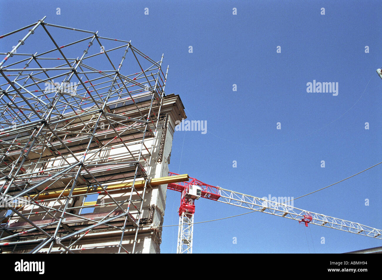 building cranes and scaffolding on site Stock Photo - Alamy