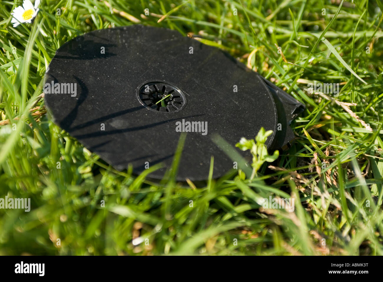 peace of a cdbox thrown away Stock Photo - Alamy