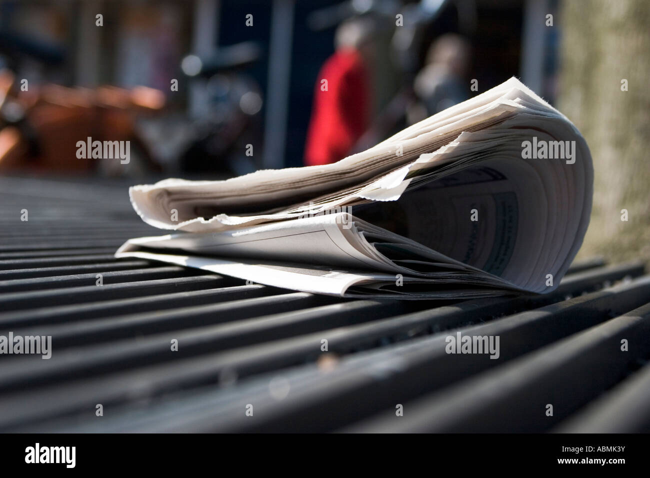Newspaper on the street Stock Photo - Alamy